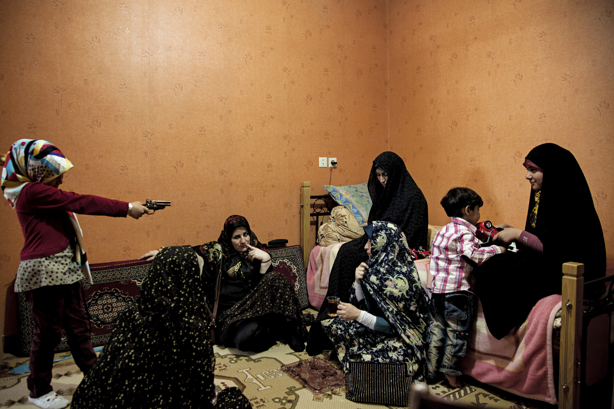 Iranian Living Room Features Photographs Of Everyday Life In The