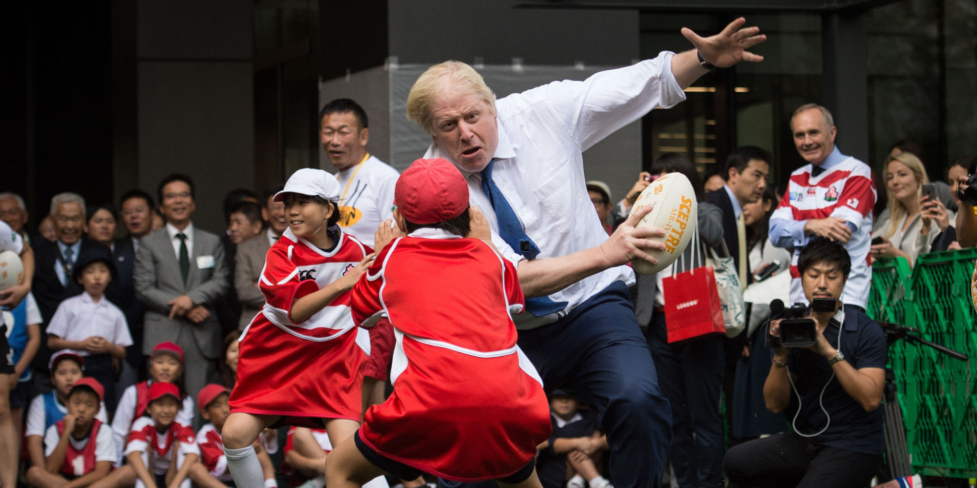 Boris Johnson Brutally Takes Out Japanese School Boy During Rugby ... Boris Johnson Brutally Takes Out Japanese School Boy During Rugby ...