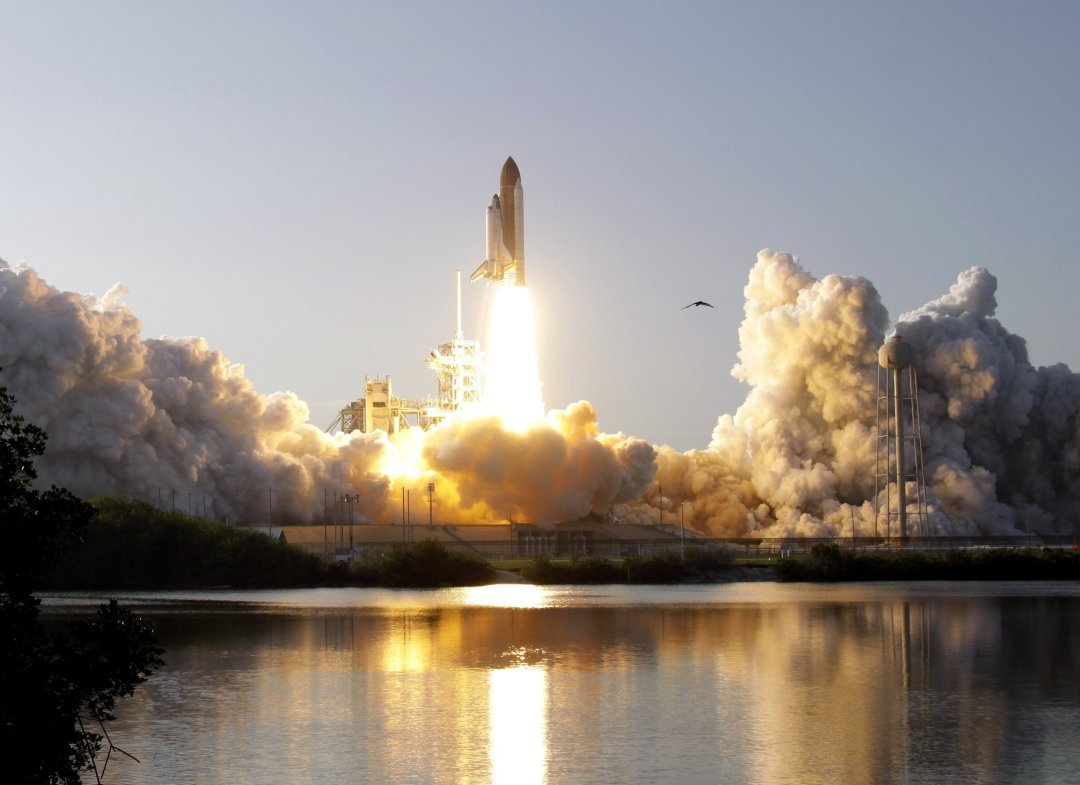 The best Space Shuttle launch picture of all time? STS-133 : r/space