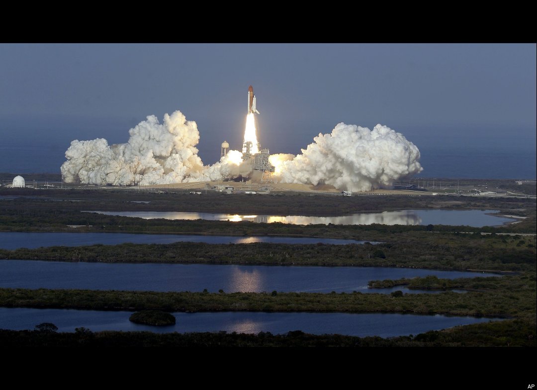 The best Space Shuttle launch picture of all time? STS-133 : r/space