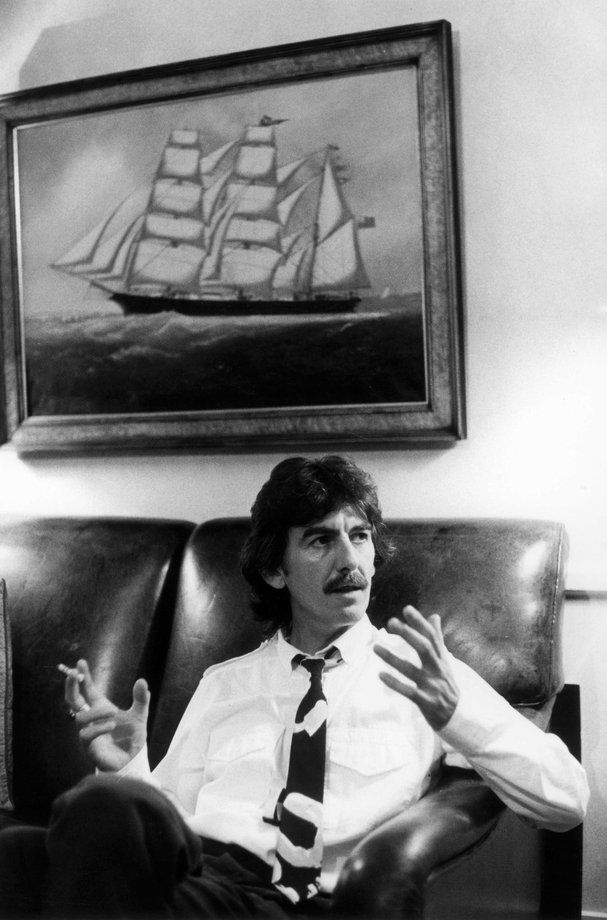Portrait of George Harrison in his office London 1982 during an ...